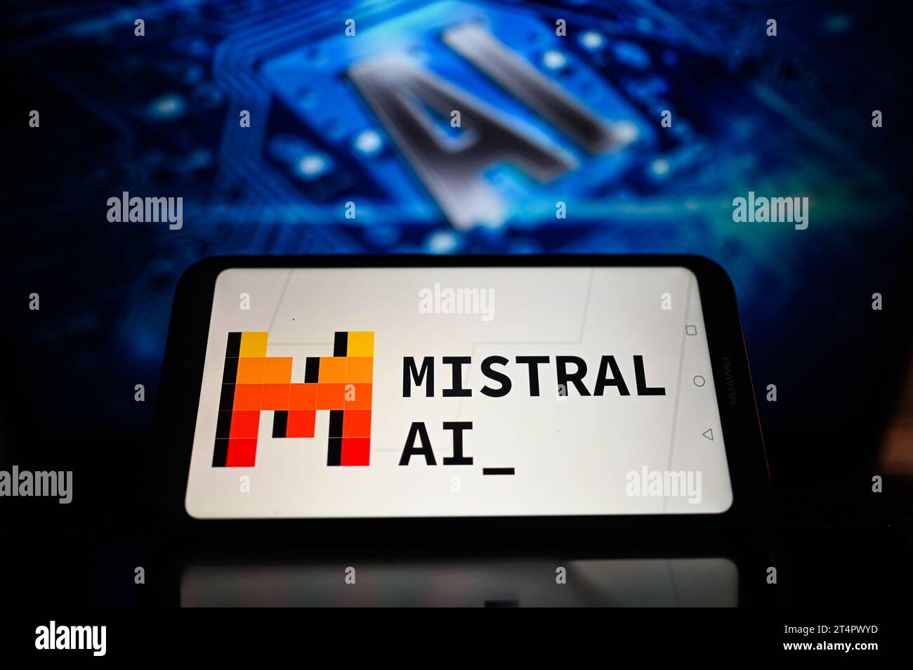 In this photo illustration, a Mistral AI logo is displayed on a ...