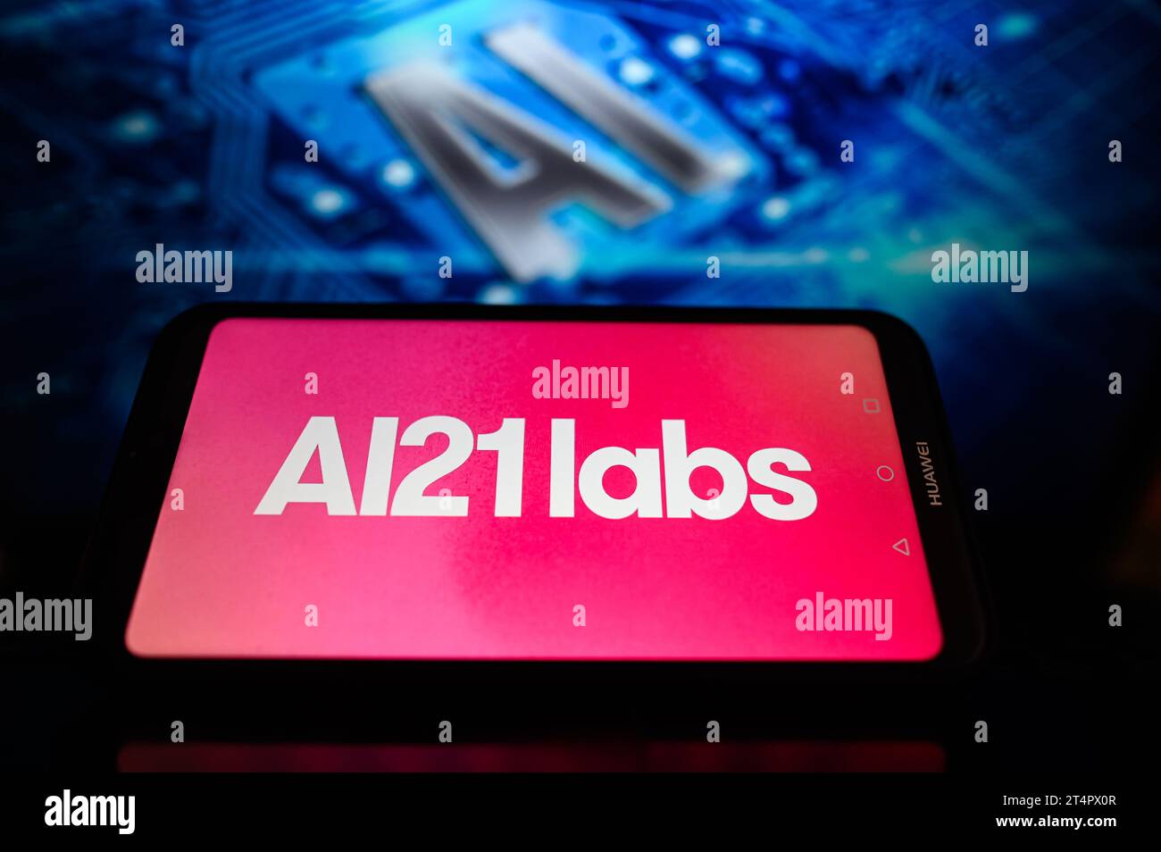 In this photo illustration, an AI21Labs logo is displayed on a smartphone with Artificial ...