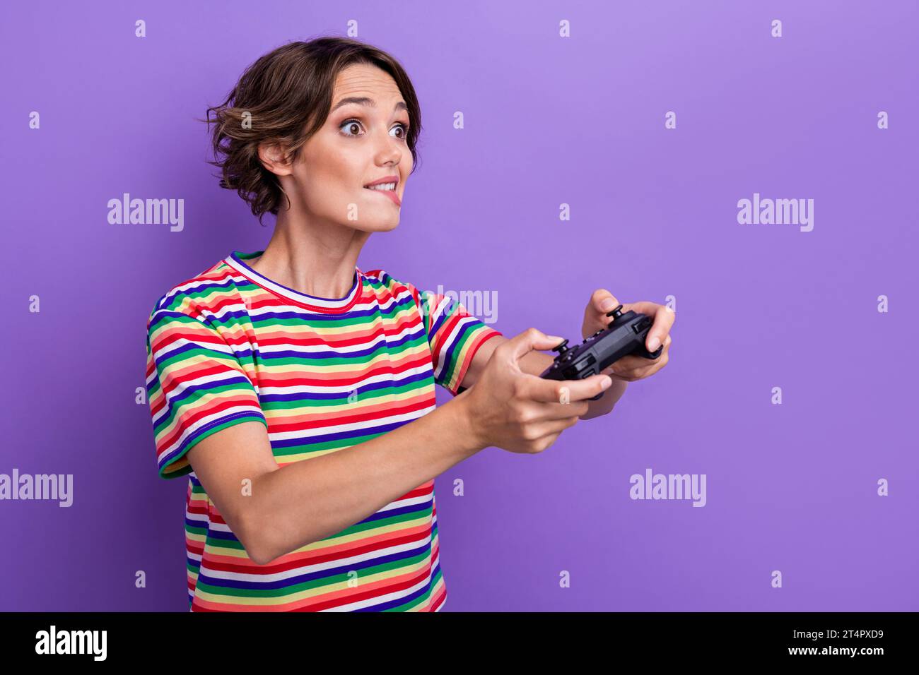 Profile photo of nervous person hold controller play games biting lips ...