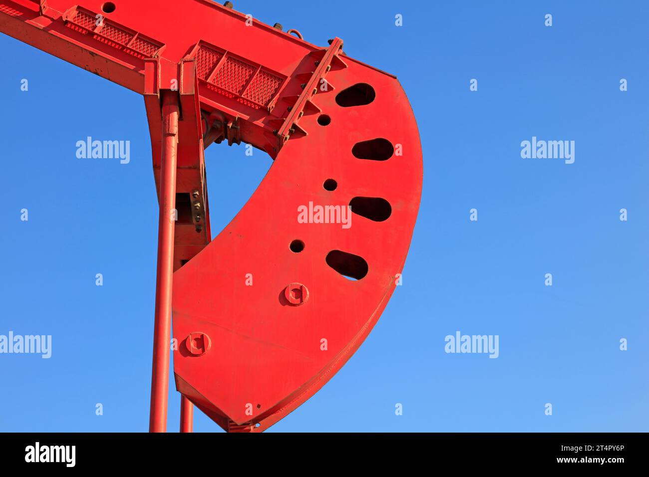 pumping unit mechanical components under blue sky in oilfield Stock ...