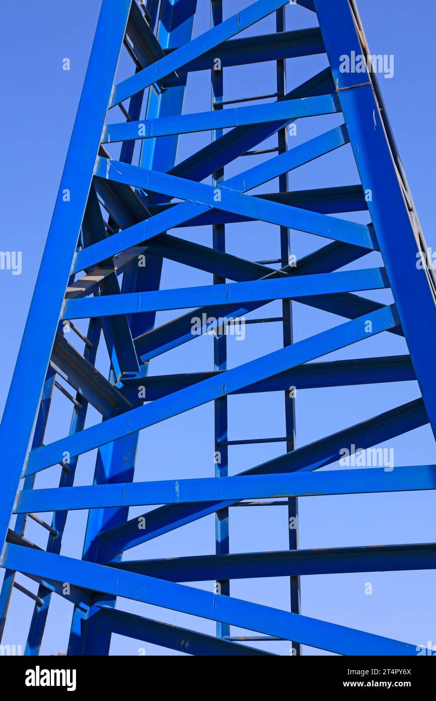 Pumping unit metal framework under blue sky in oilfield Stock Photo - Alamy