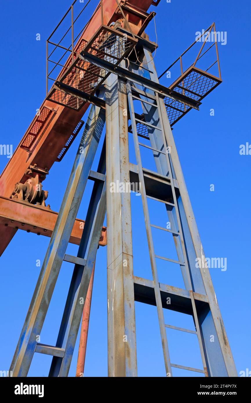 Pumping unit metal framework under blue sky in oilfield Stock Photo - Alamy