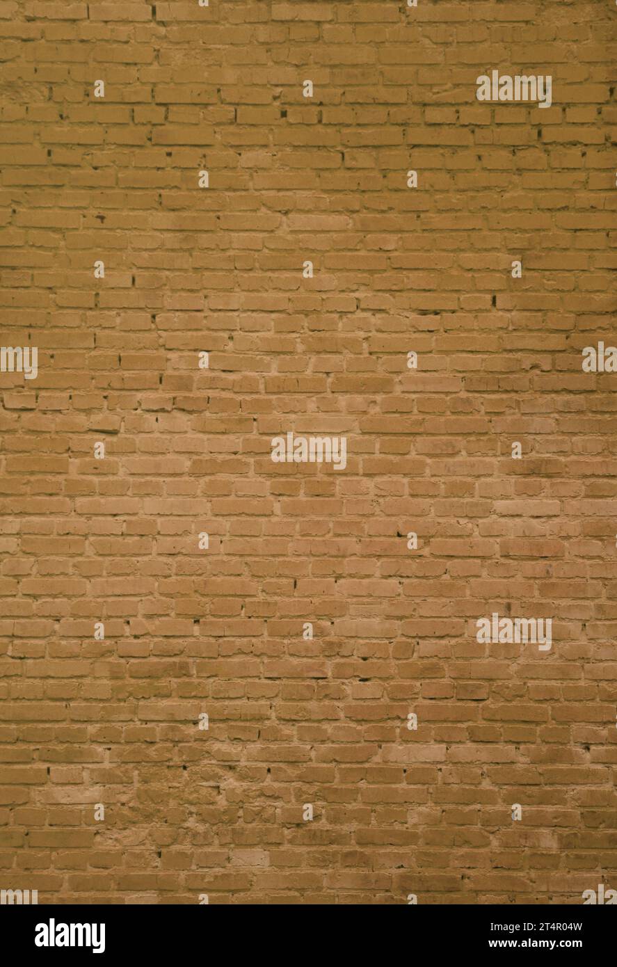 The texture of the brick wall of many rows of bricks painted in brown ...
