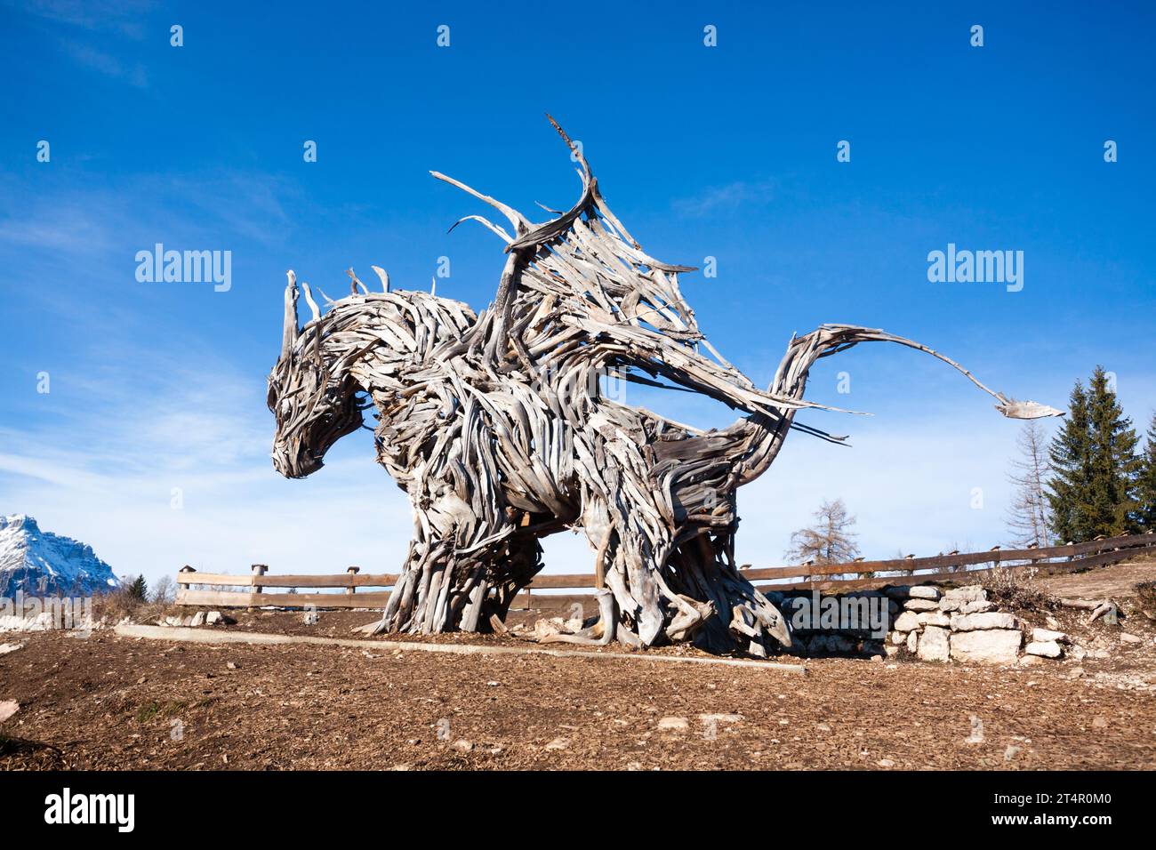 Wooden sculpture of a dragon made of tree branches. Vaia tempest dragon ...