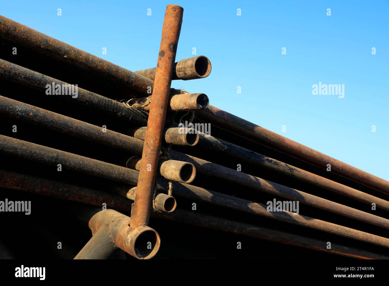 Oxidation rust steel pipe pile up together in a factory Stock Photo - Alamy