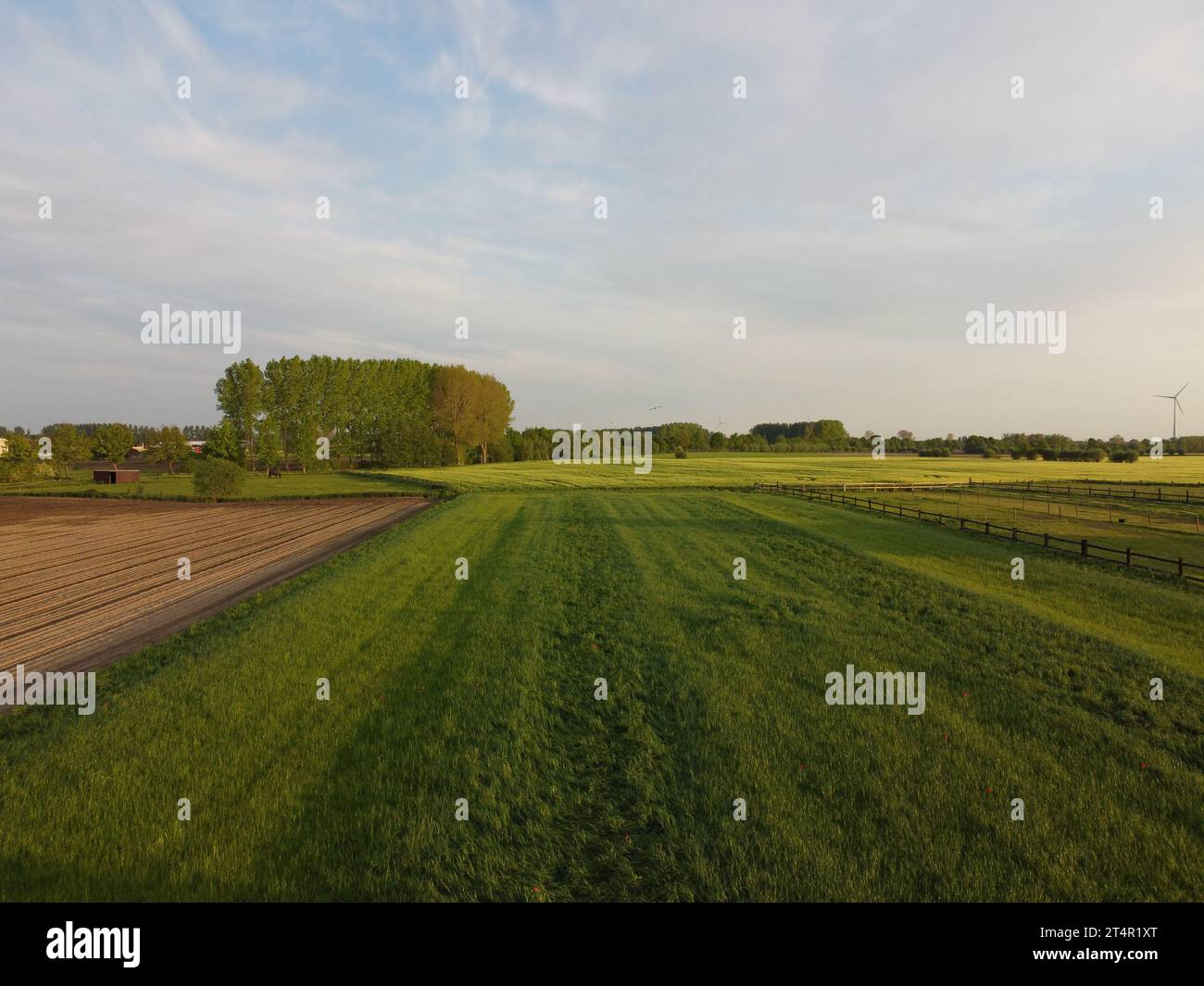 Sunset droneshot of the countryside in Sint-Anna, Belgium Stock Photo ...