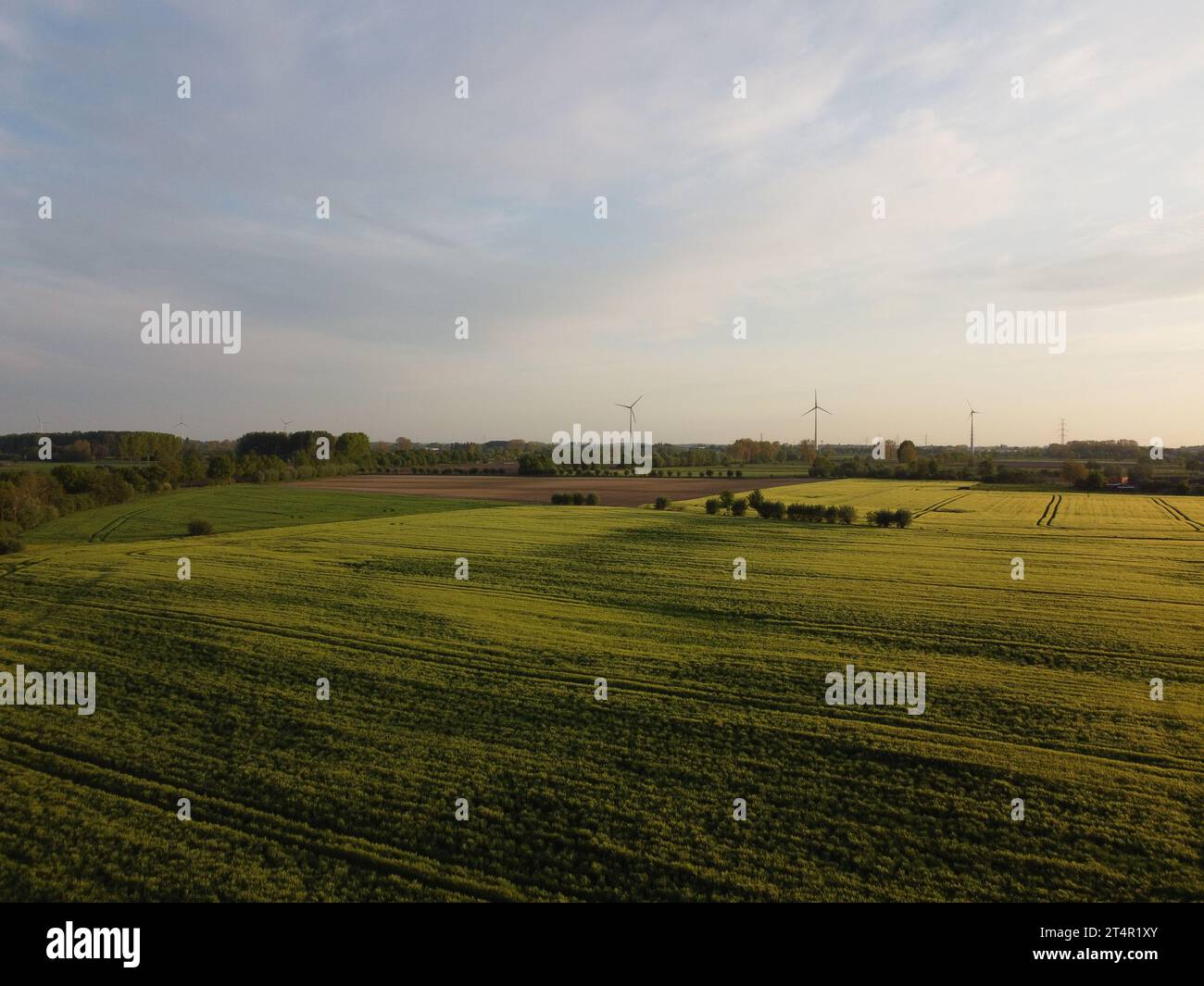 Sunset droneshot of the countryside in Sint-Anna, Belgium Stock Photo ...