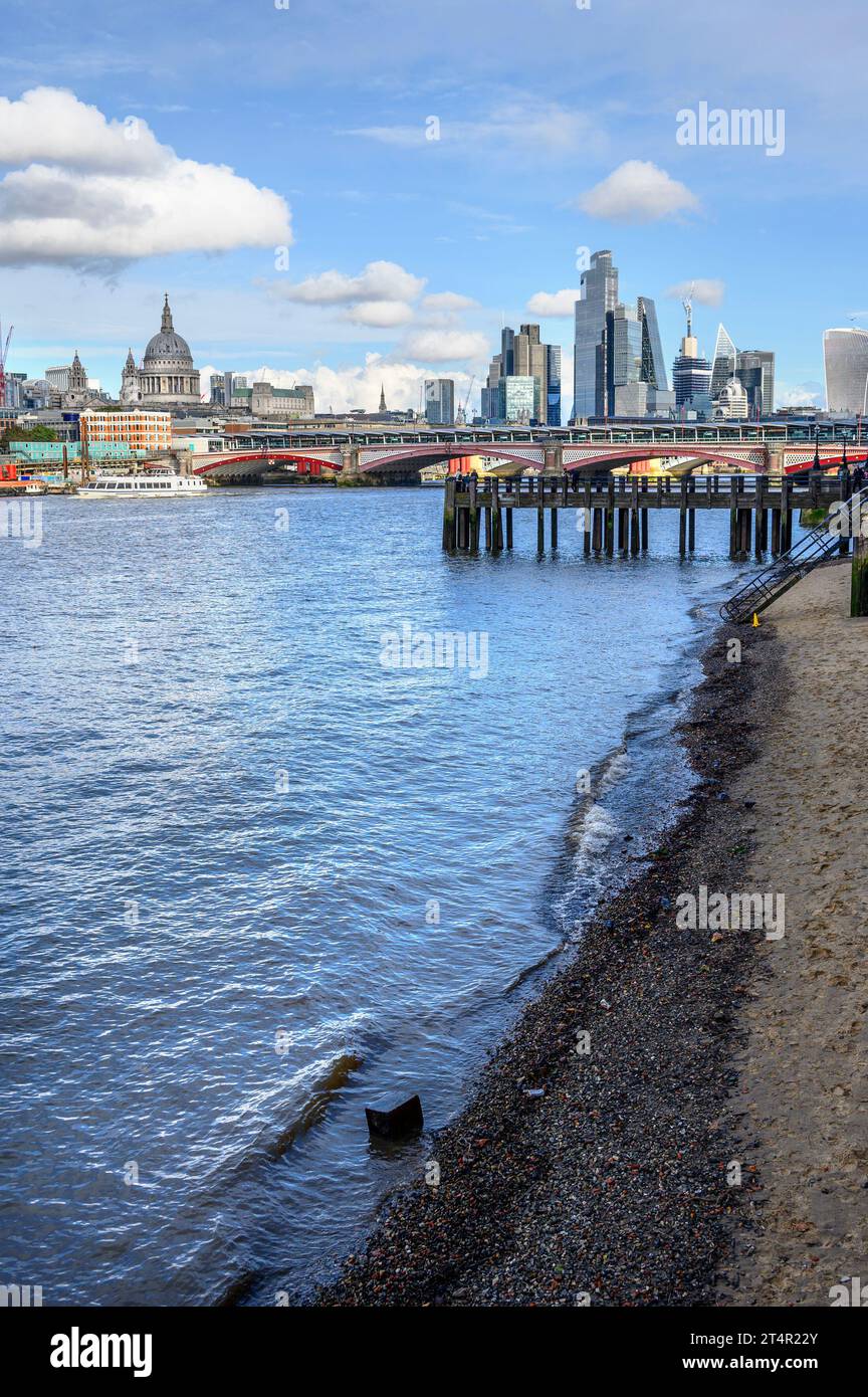 London, England, UK. River Thames at low tide - St Paul's Cathedral and ...
