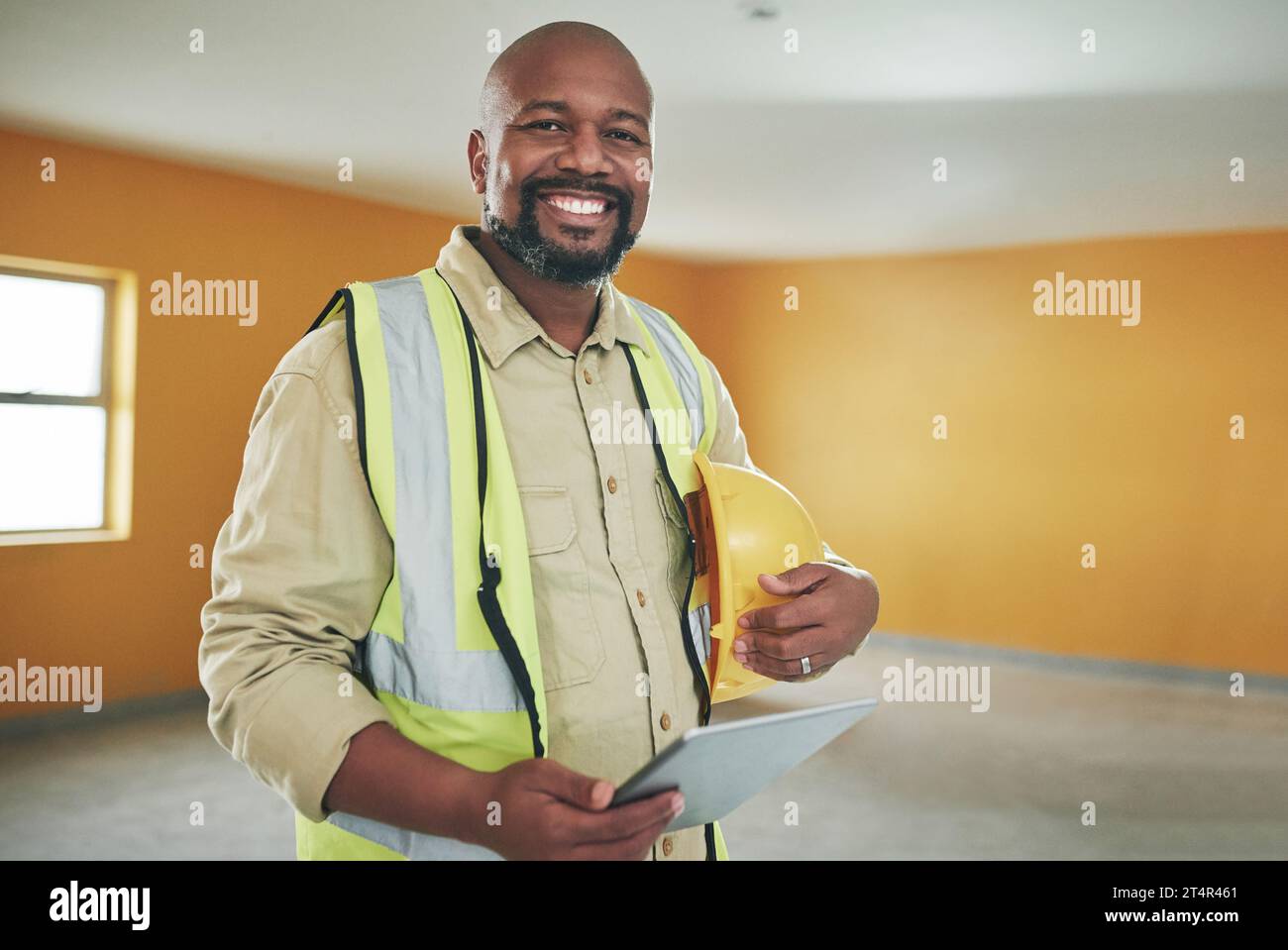 The smartest tool in a safety inspectors arsenal. a confident man using ...