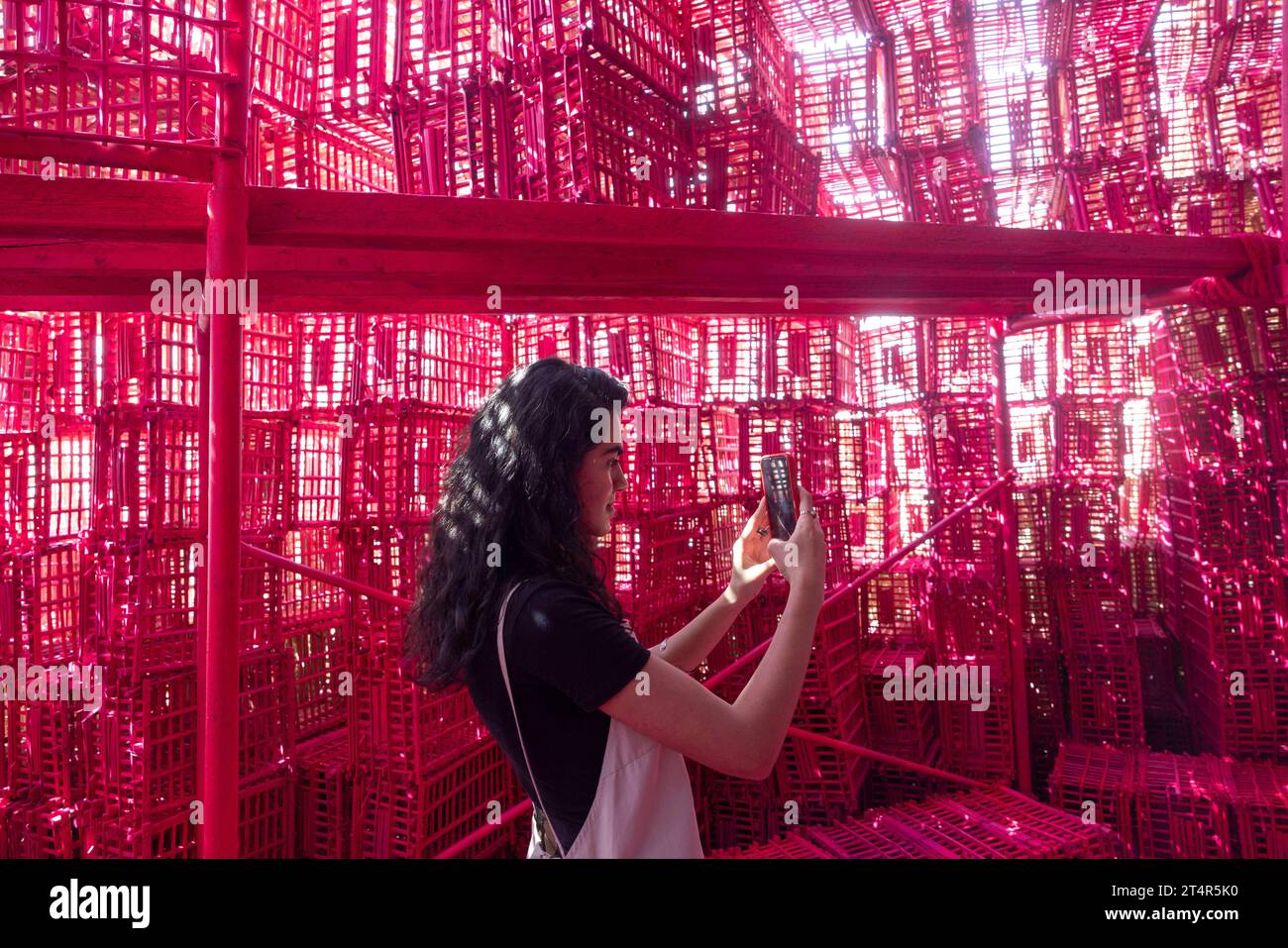 A visitor is seen inside ‘Translucent Pyramid’ by Saudi artist Rashed ...