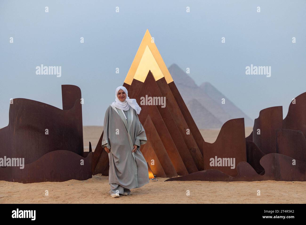 Cairo, Egypt. 28th Oct, 2023. Emirati artist Azza al Qubaisi poses next ...
