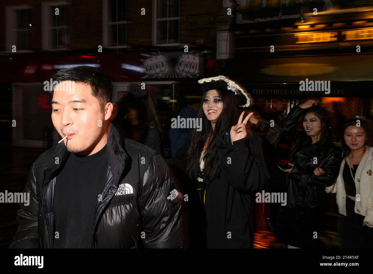 People in fancy dress celebrating, Halloween, Old Compton Street, Soho ...