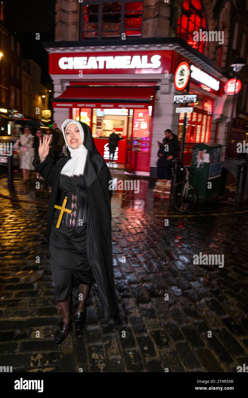 People in fancy dress celebrating, Halloween, Old Compton Street, Soho ...