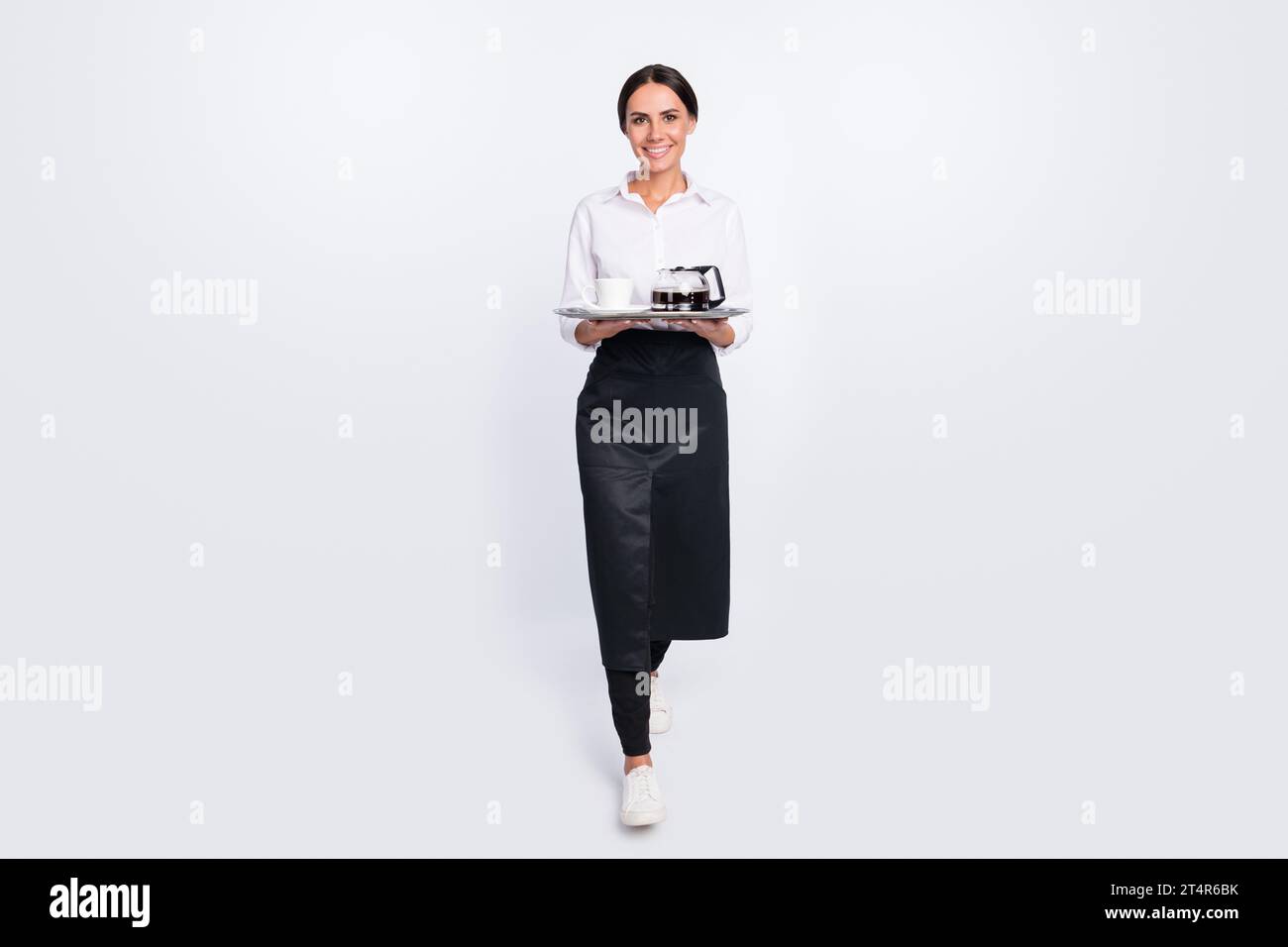 Full length body size photo of positive waitress walking with coffee ...
