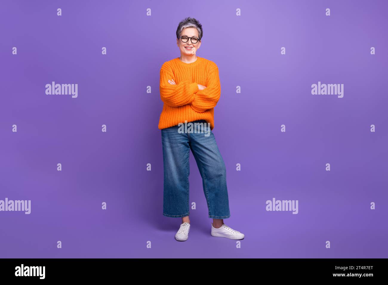 Full length photo of cheerful assertive woman dressed orange sweater ...