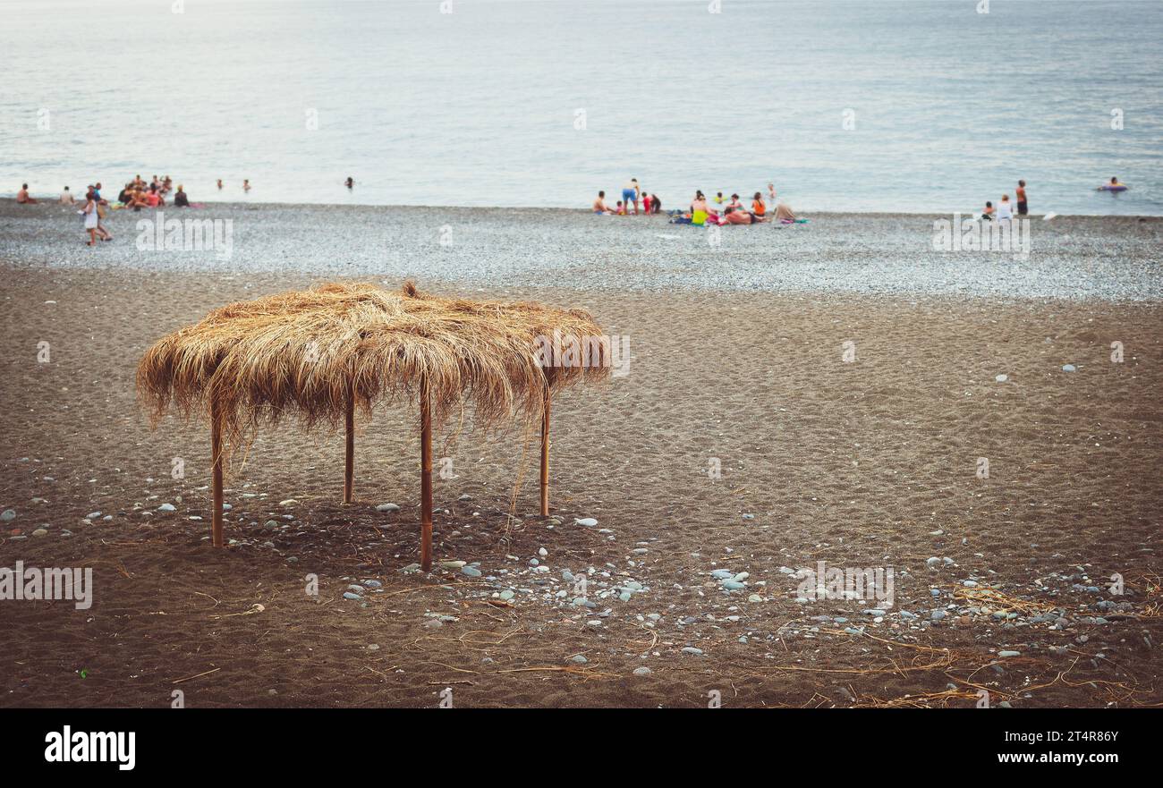 resort sea beach with straw canopy Stock Photo - Alamy