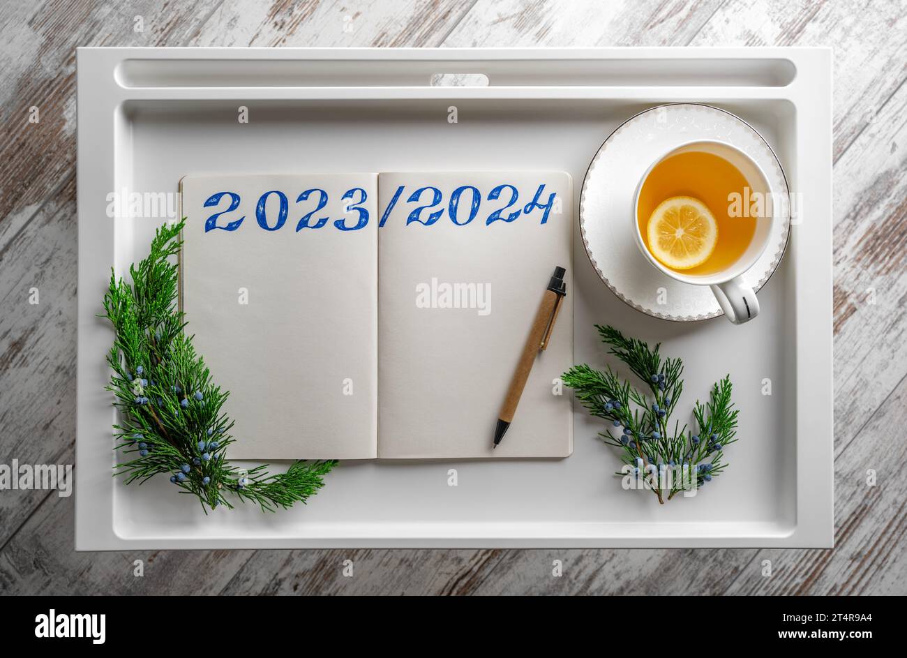 Numbers 2023-2024 in a notepad Stock Photo - Alamy