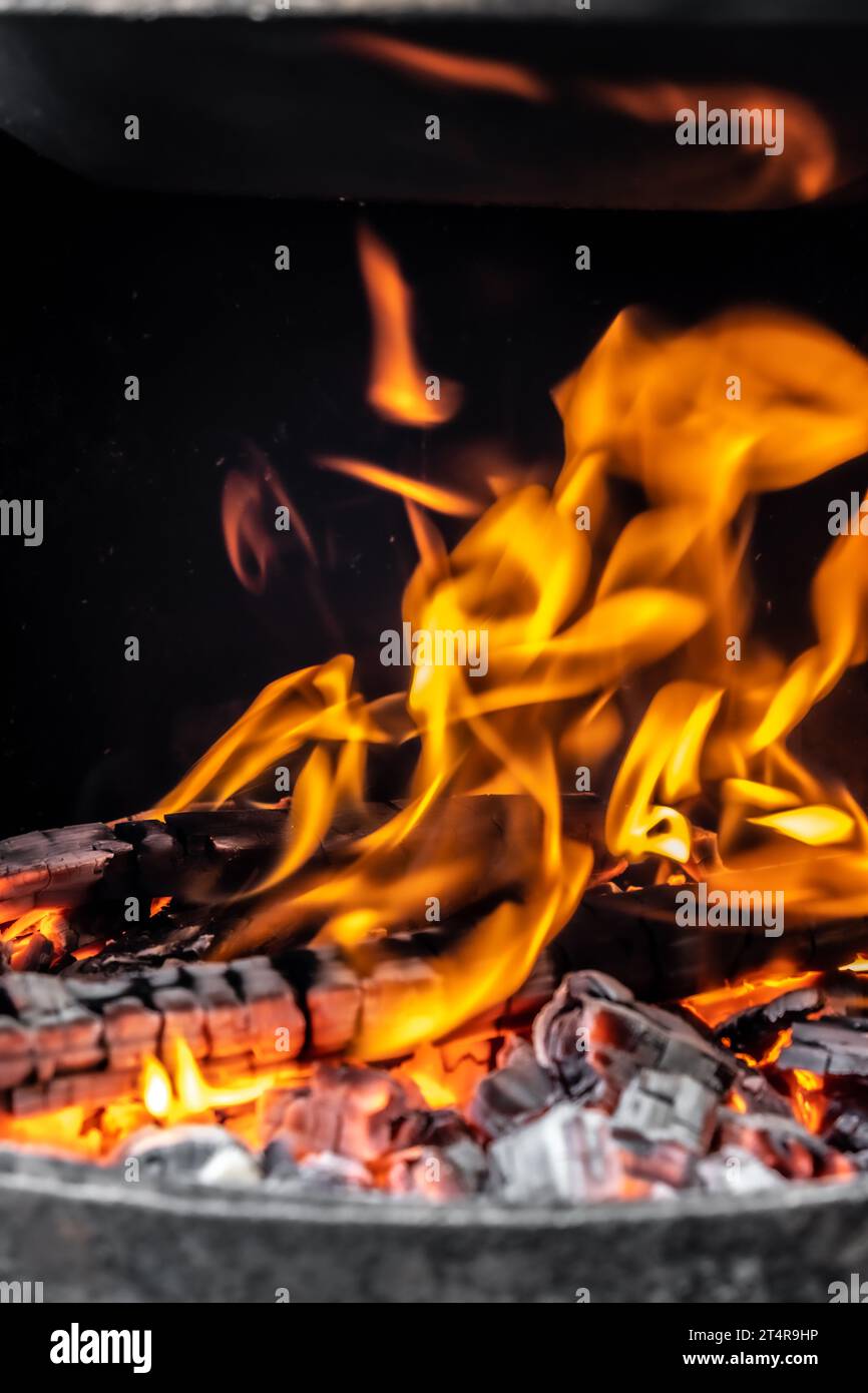 Burning coals in a metal grill for frying meat and vegetables Stock ...