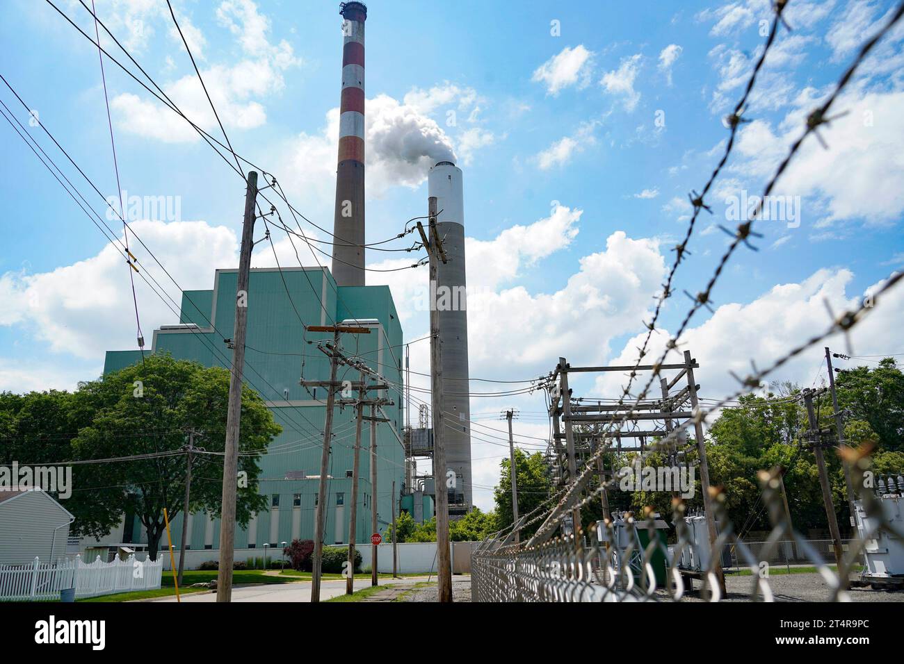 FILE - In this file photo from June 10, 2021, a flume of emissions flow ...