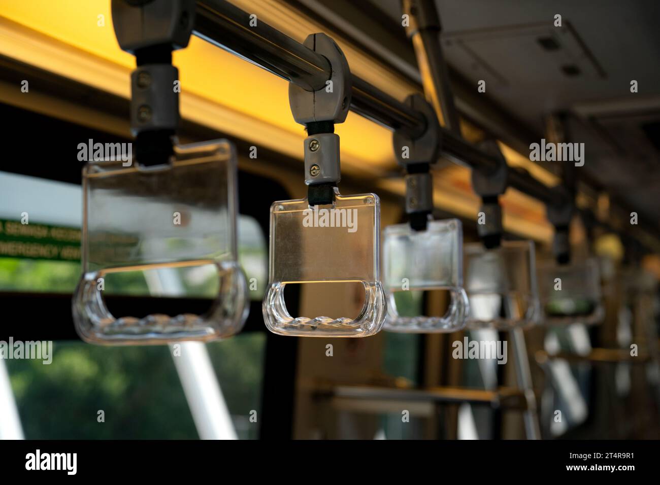 Close-up to Train handle in selected focus by public transportation ...