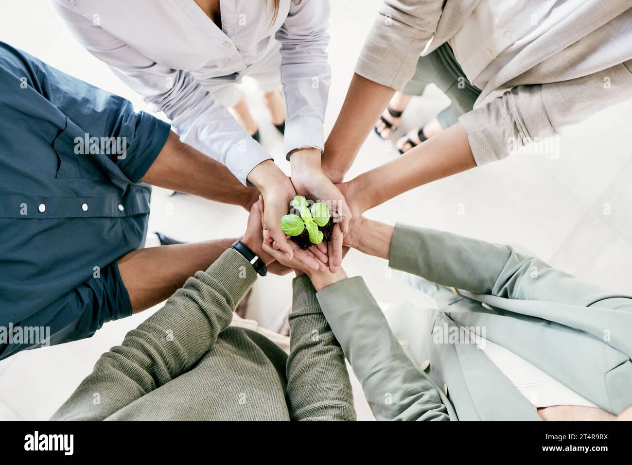 These things take time. a group of unrecognizable businesspeople holing ...