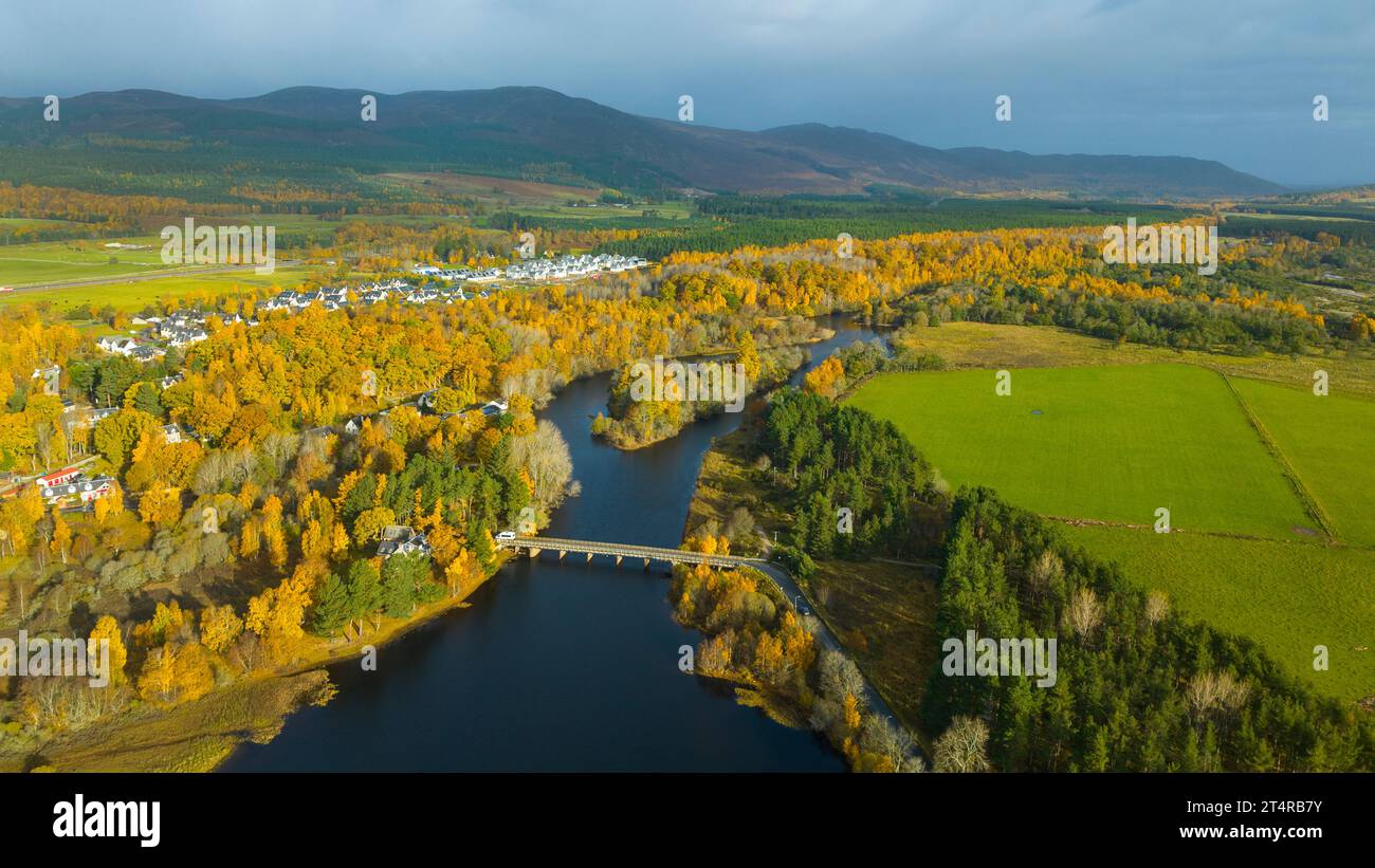 Aerial view of River Spey and autumn colours in woodland at , Kincraig ...