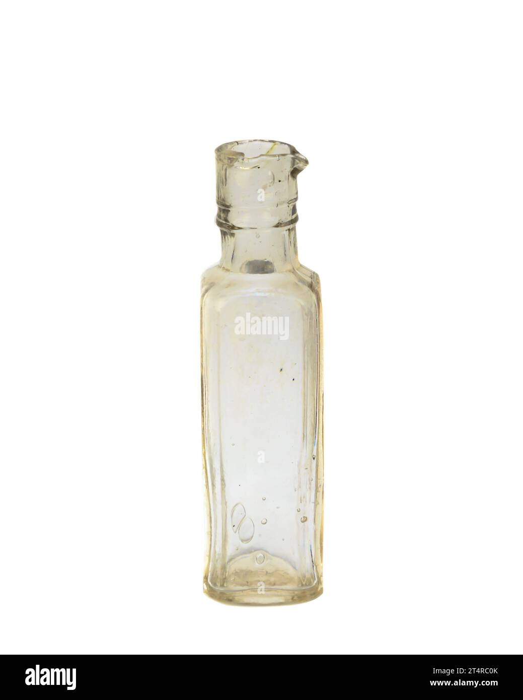 Vintage small glear glass medicine bottle isolated with a white ...