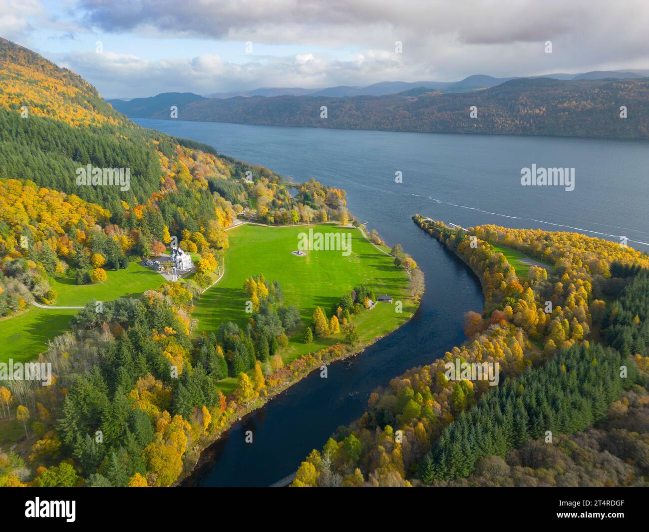 Aerial view of River Moriston as it flows into Loch Ness with autumn ...