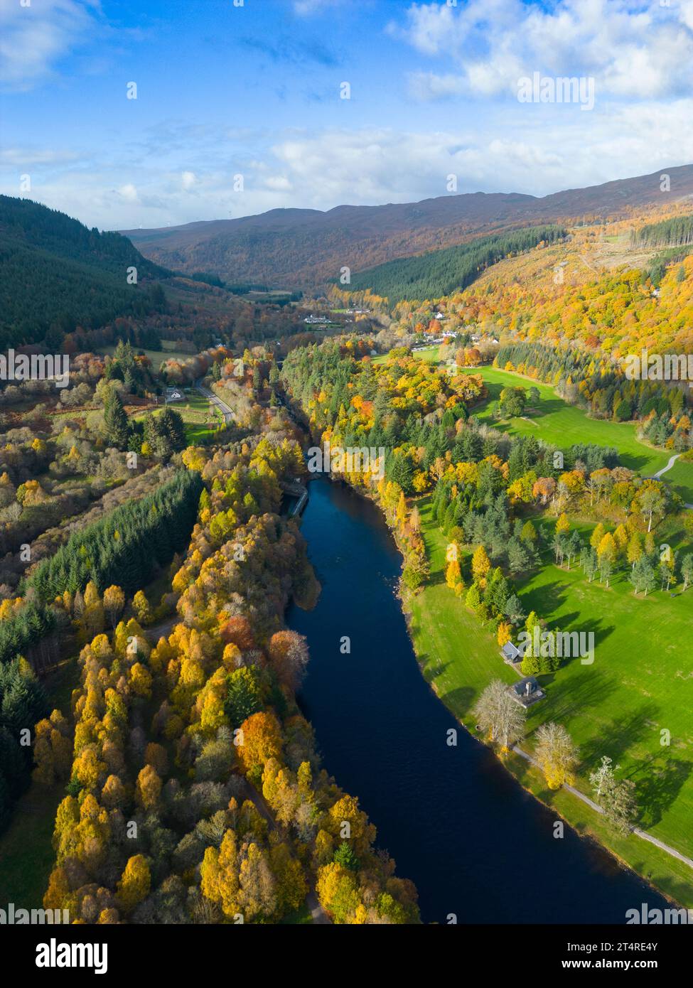 Aerial view of River Moriston and woodland with autumn colours in ...