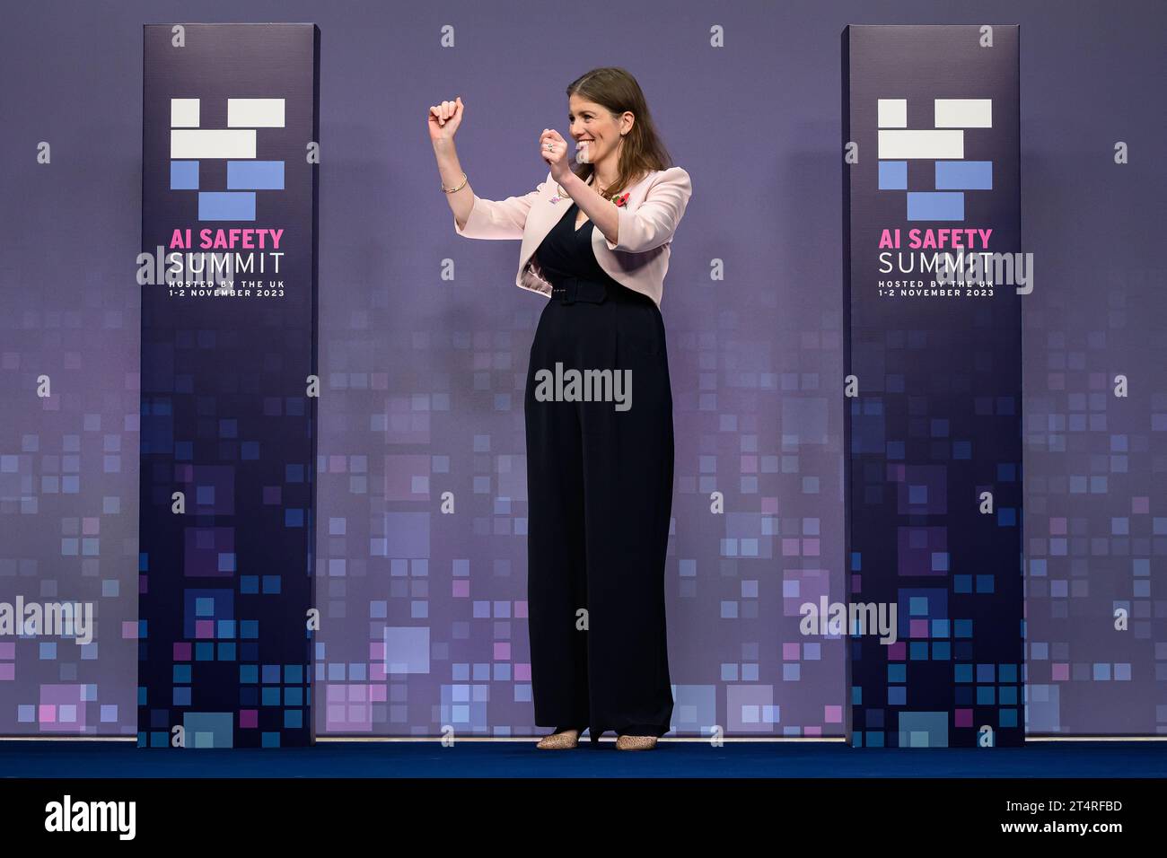 Technology Secretary Michelle Donelan on stage ahead of the family ...