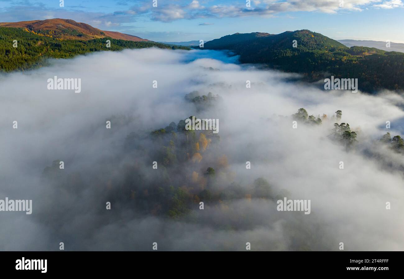 Aerial view of early morning cloud inversion beside Loch Beinn a ...