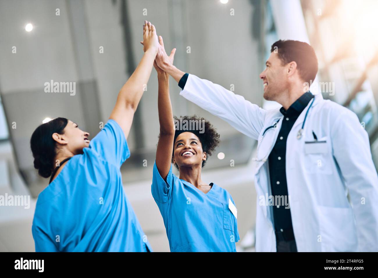 We save lives when we work together. a diverse team of doctors giving ...