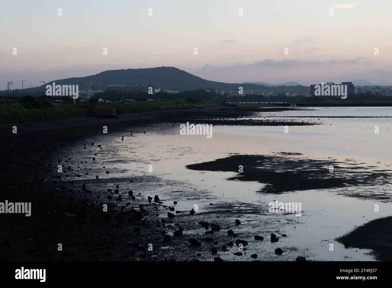 A peaceful beach scene featuring an abundance of blue tones Stock Photo ...