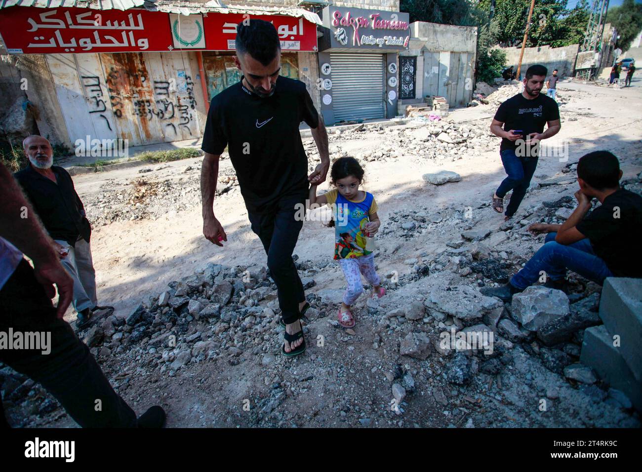 Jenin, Palestine. 01st Nov, 2023. Palestinians inspect the damage of ...