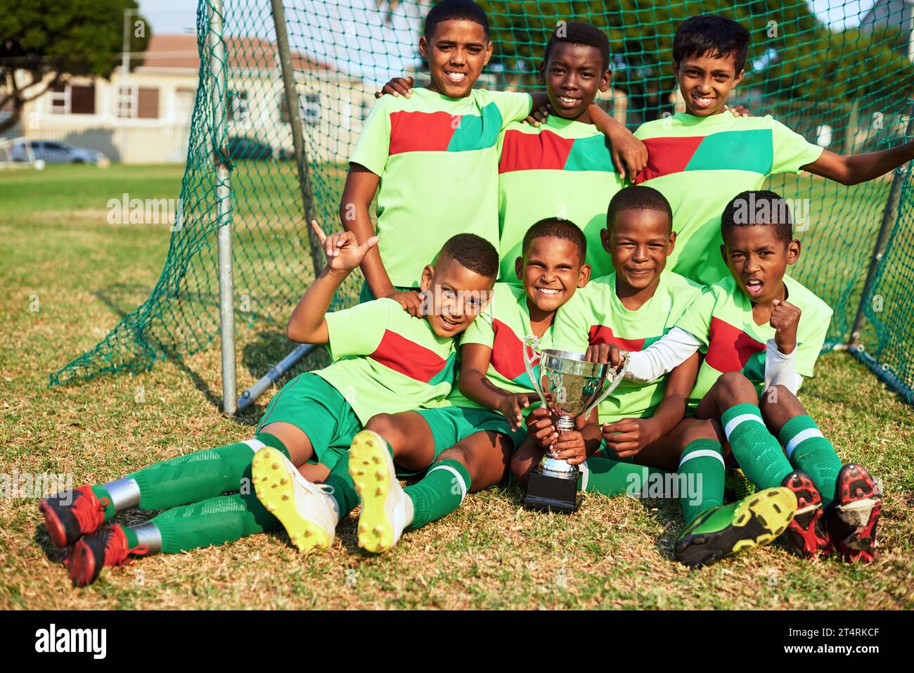 Players win games, teams win championships. Portrait of a boys soccer ...