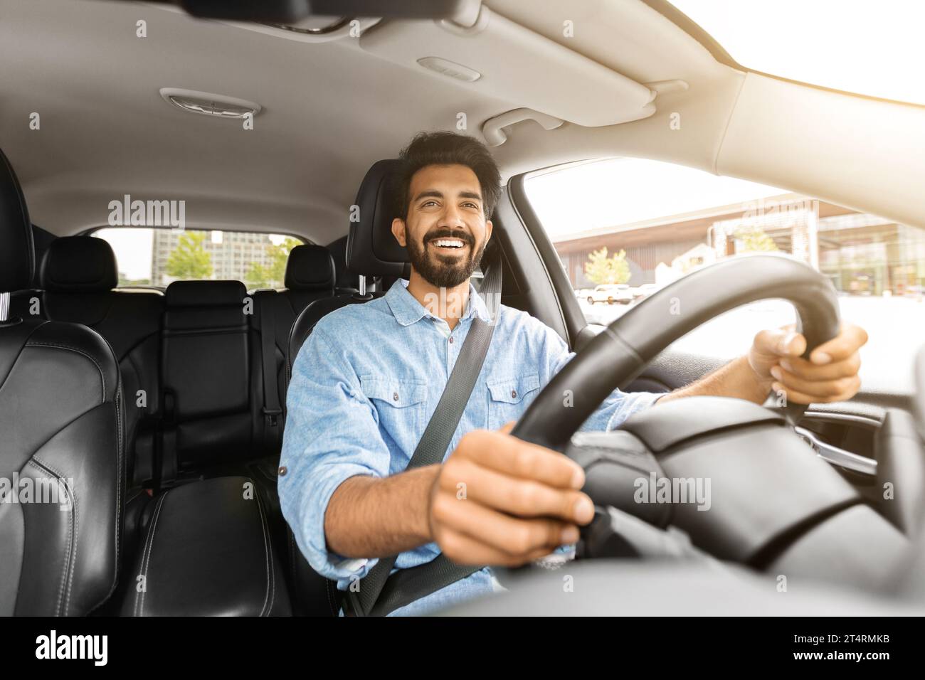 Indian Young Man Driving Auto, Posing Sitting In Driver's Seat Stock ...
