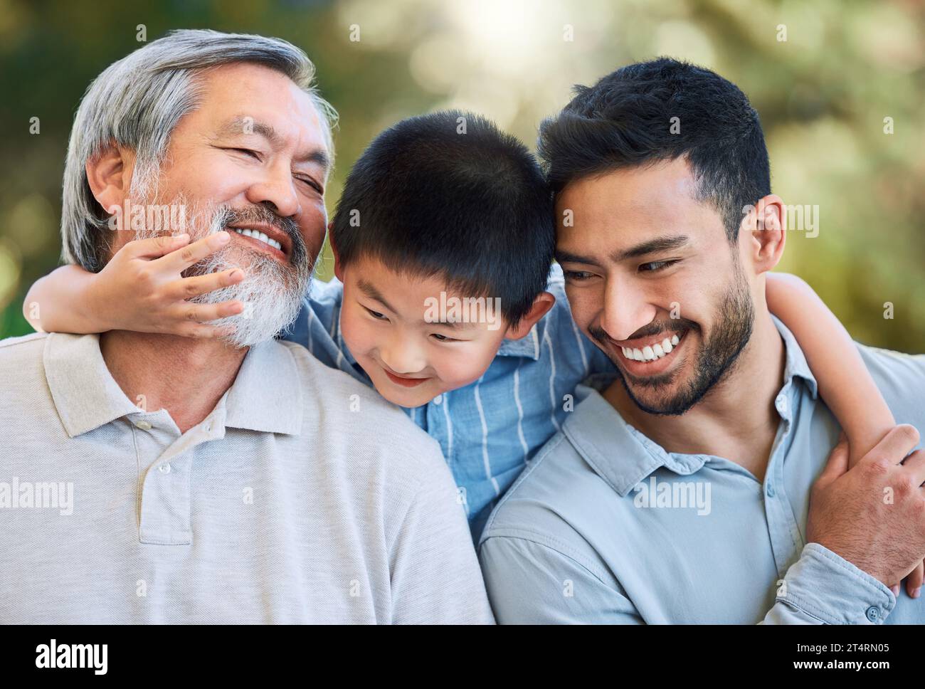 Three generations of joy. an adorable little boy spending a fun day in ...