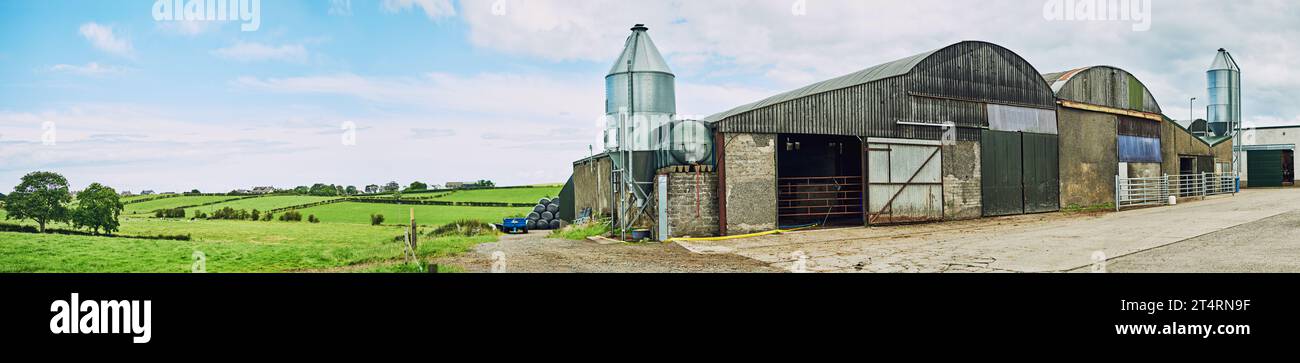 Farmland landscape. a dairy factory on wide open farmland in the ...