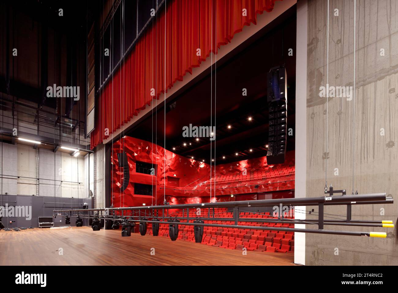 Large auditorium (grote zaal) seen from rear of stage, with raised ...