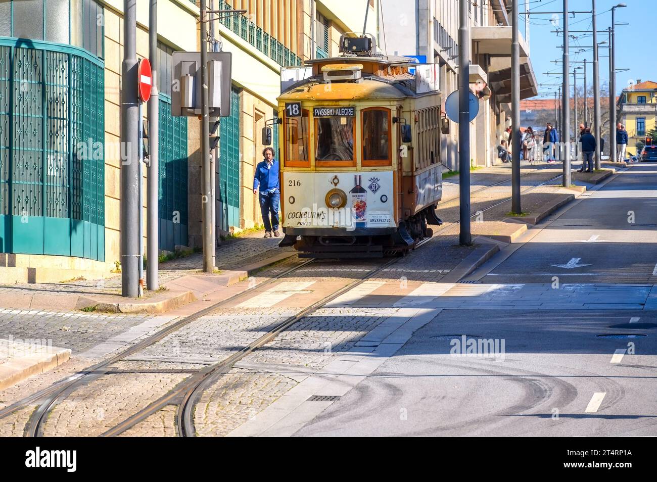 Porto, Portugal, 2023, old tram or tramway driving on a city street ...