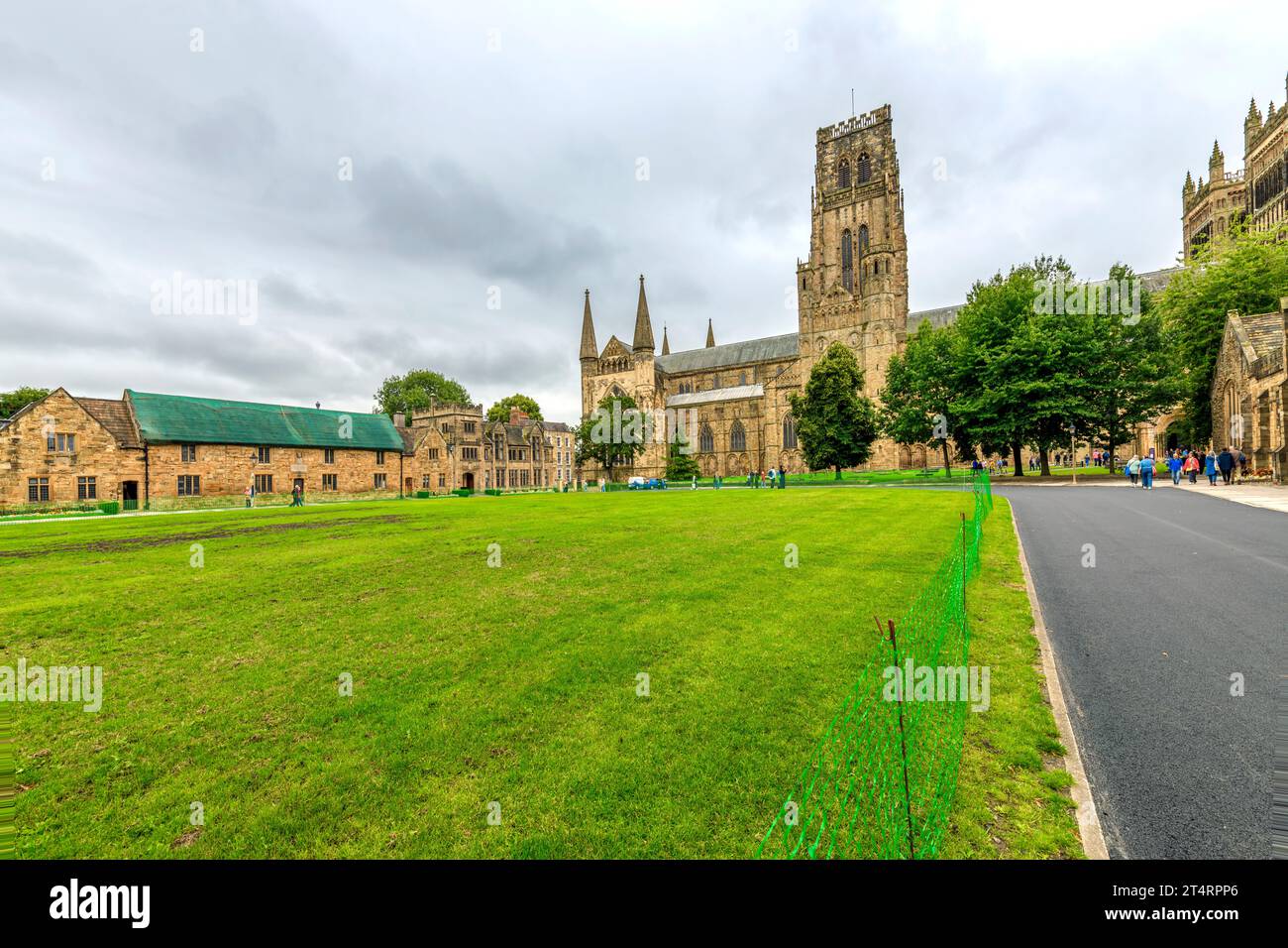 The lawn, grounds, tower and facade of the Durham Cathedral on an ...