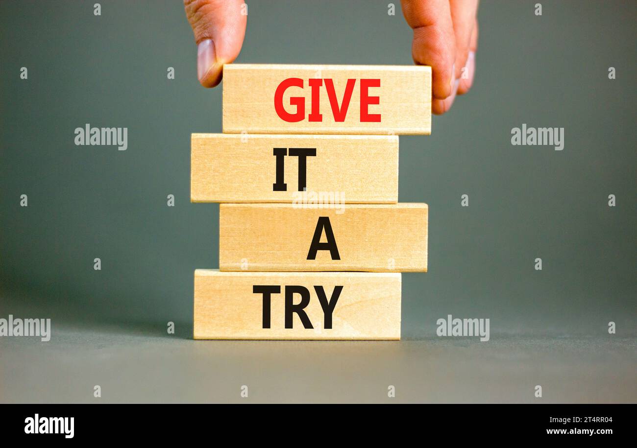 Give it a try symbol. Concept word Give it a try on beautiful wooden ...