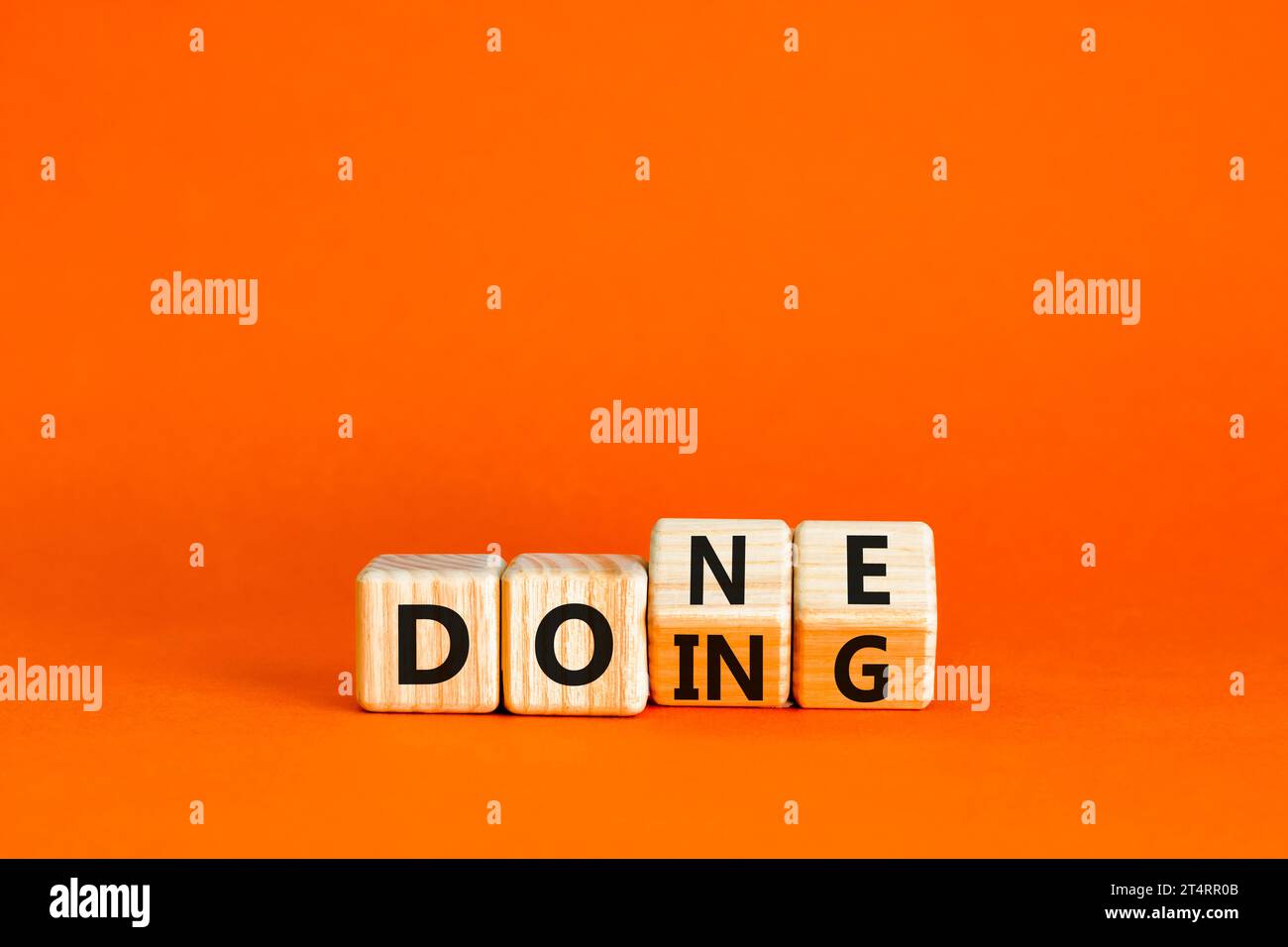 Doing and done symbol. Concept words Doing Done on wooden block ...