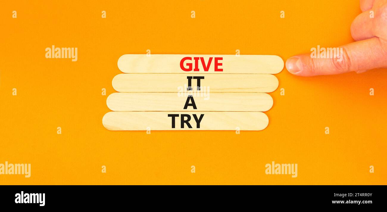 Give it a try symbol. Concept word Give it a try on beautiful wooden ...