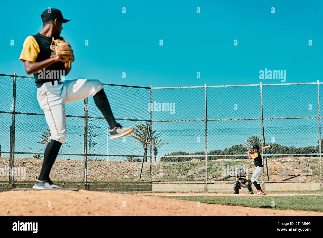 Three strikes and youre out. a young baseball player getting ready to ...