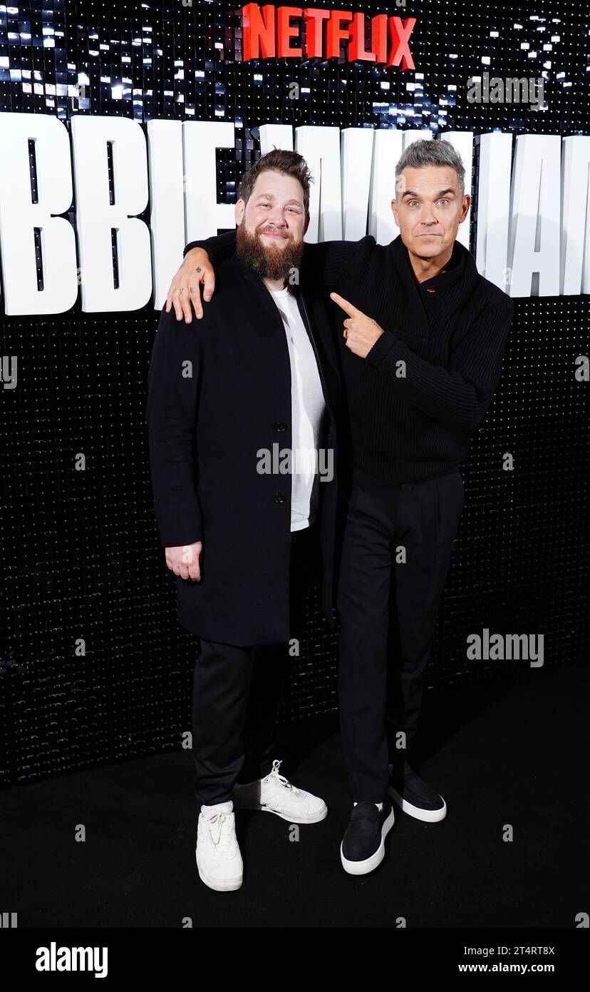 Robbie Williams and Joe Pearlman arrive for the Robbie Williams Netflix ...