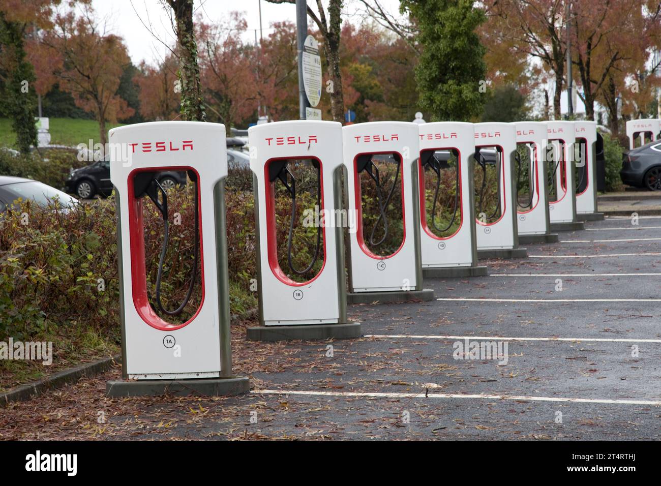 Line of unused Tesla electric vehicle high speed EV chargers in M4 ...