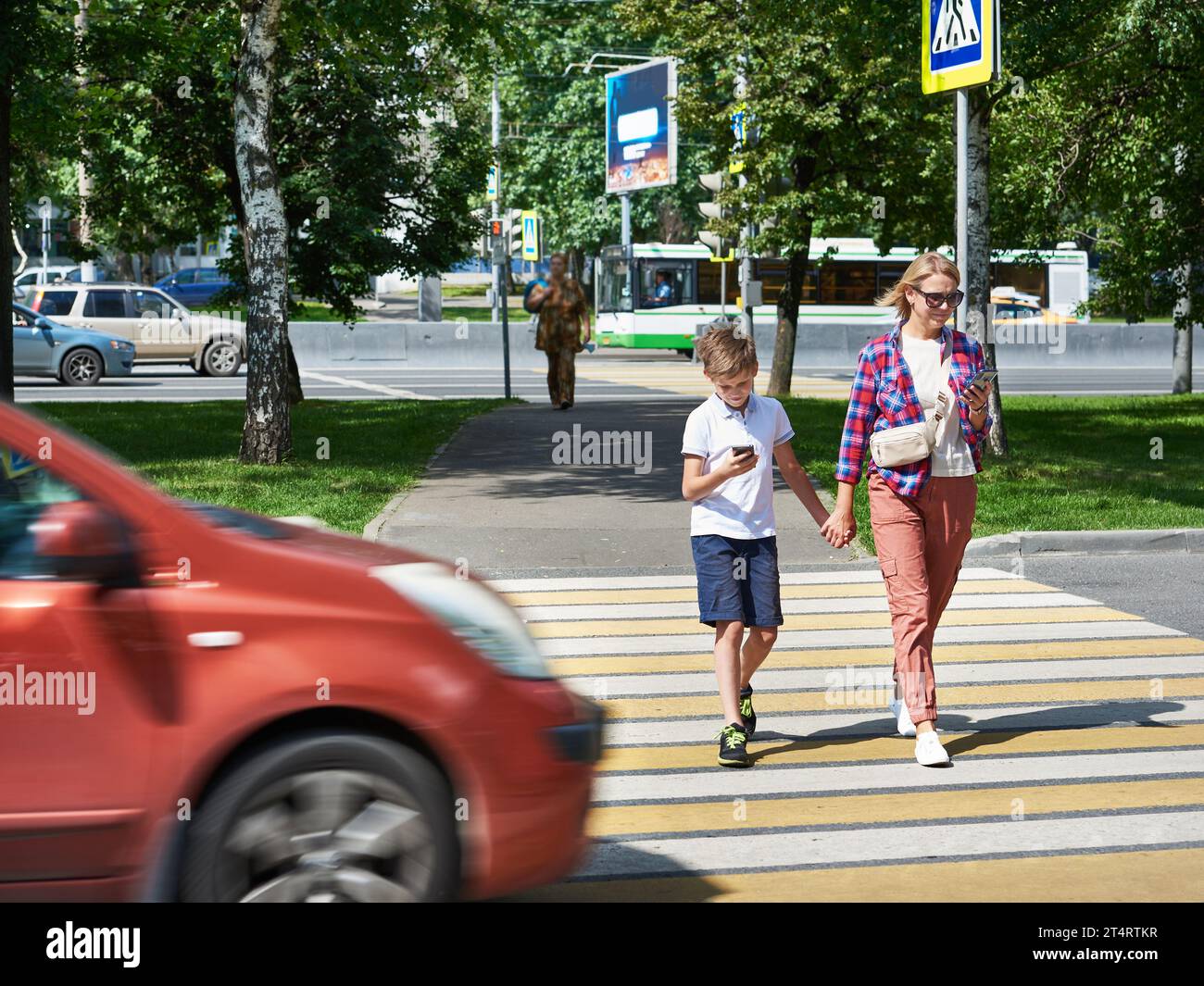 Child crossing road danger hi-res stock photography and images - Alamy
