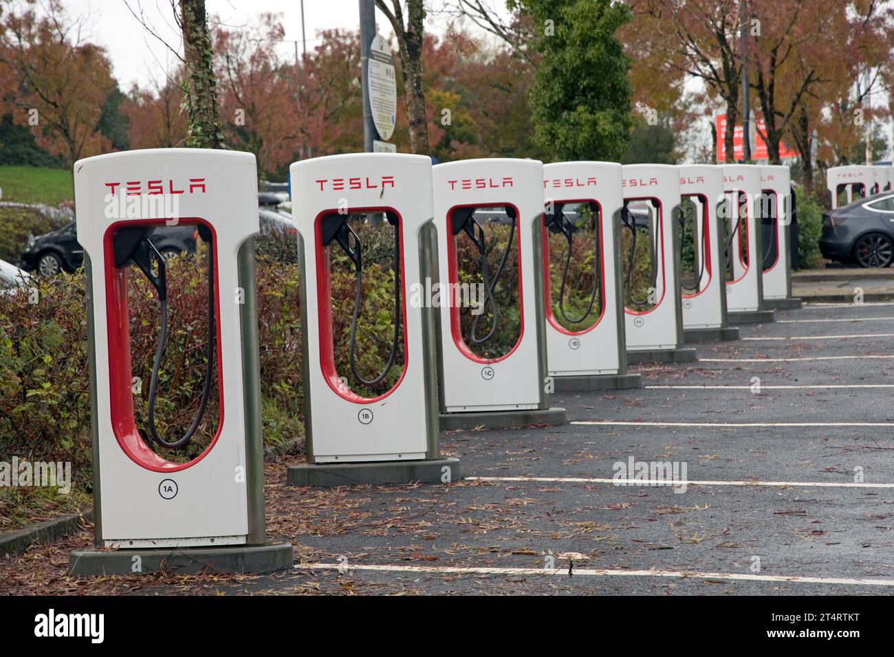 Line of unused Tesla electric vehicle high speed EV chargers in M4 ...