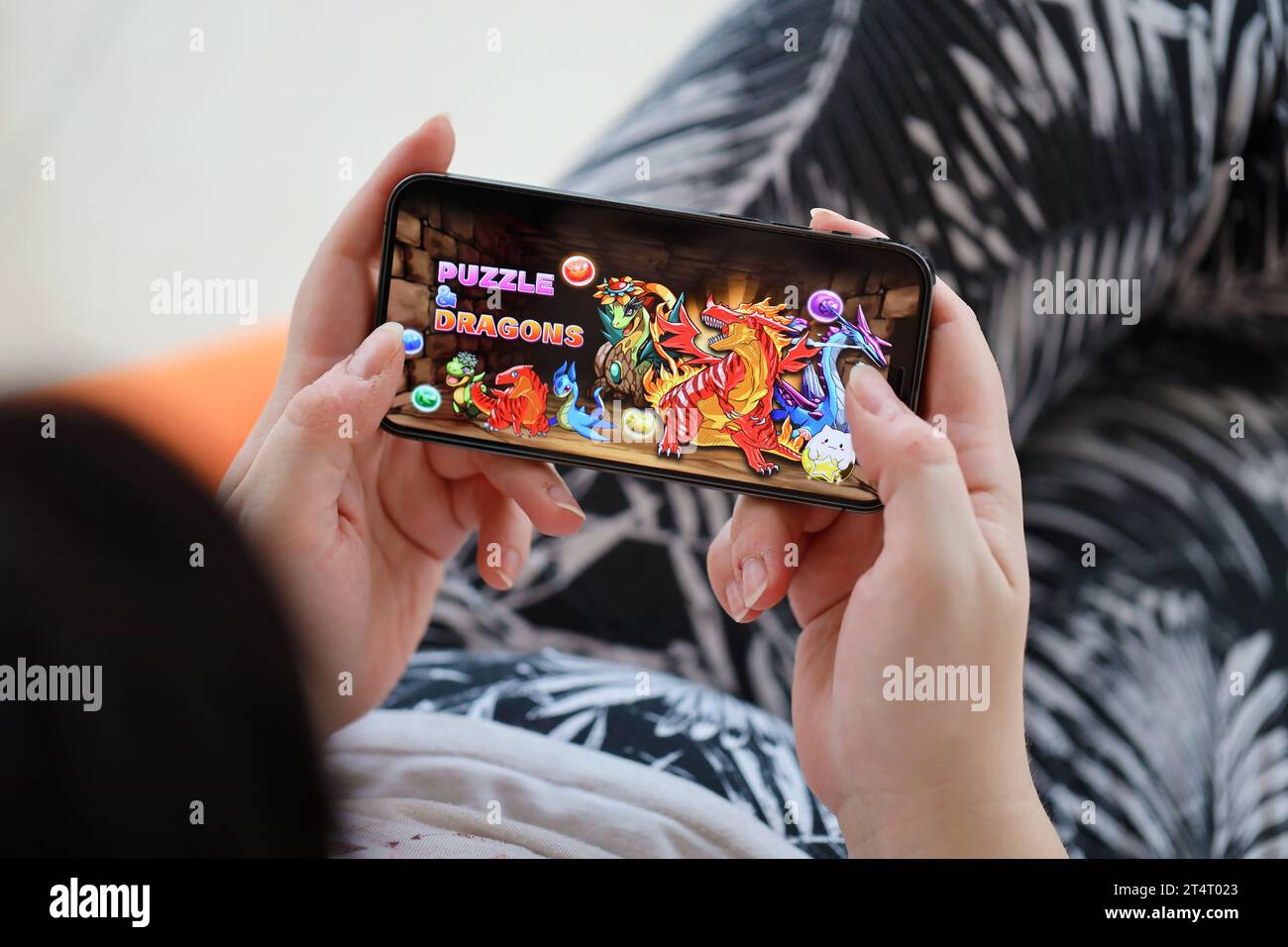 Puzzle and dragons mobile iOS game on iPhone 15 smartphone screen in ...